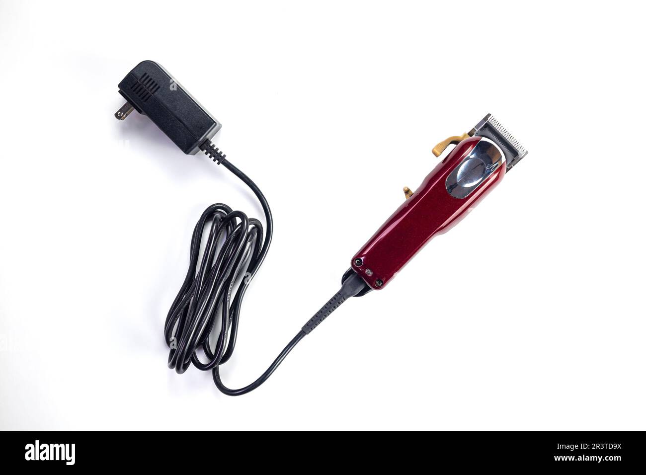 Top view of professional single red corded electric hairclipper on ...