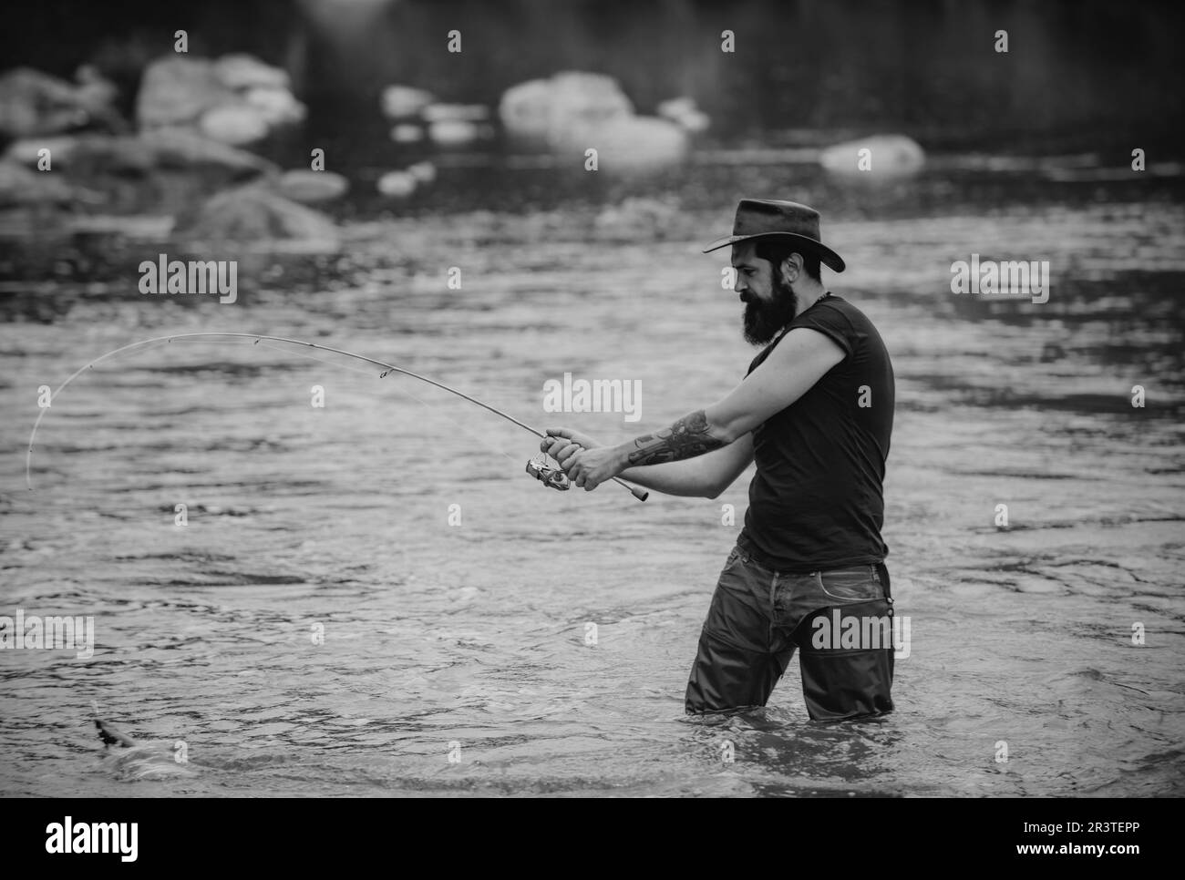 Elderly fisherman fishing rod Black and White Stock Photos & Images - Alamy