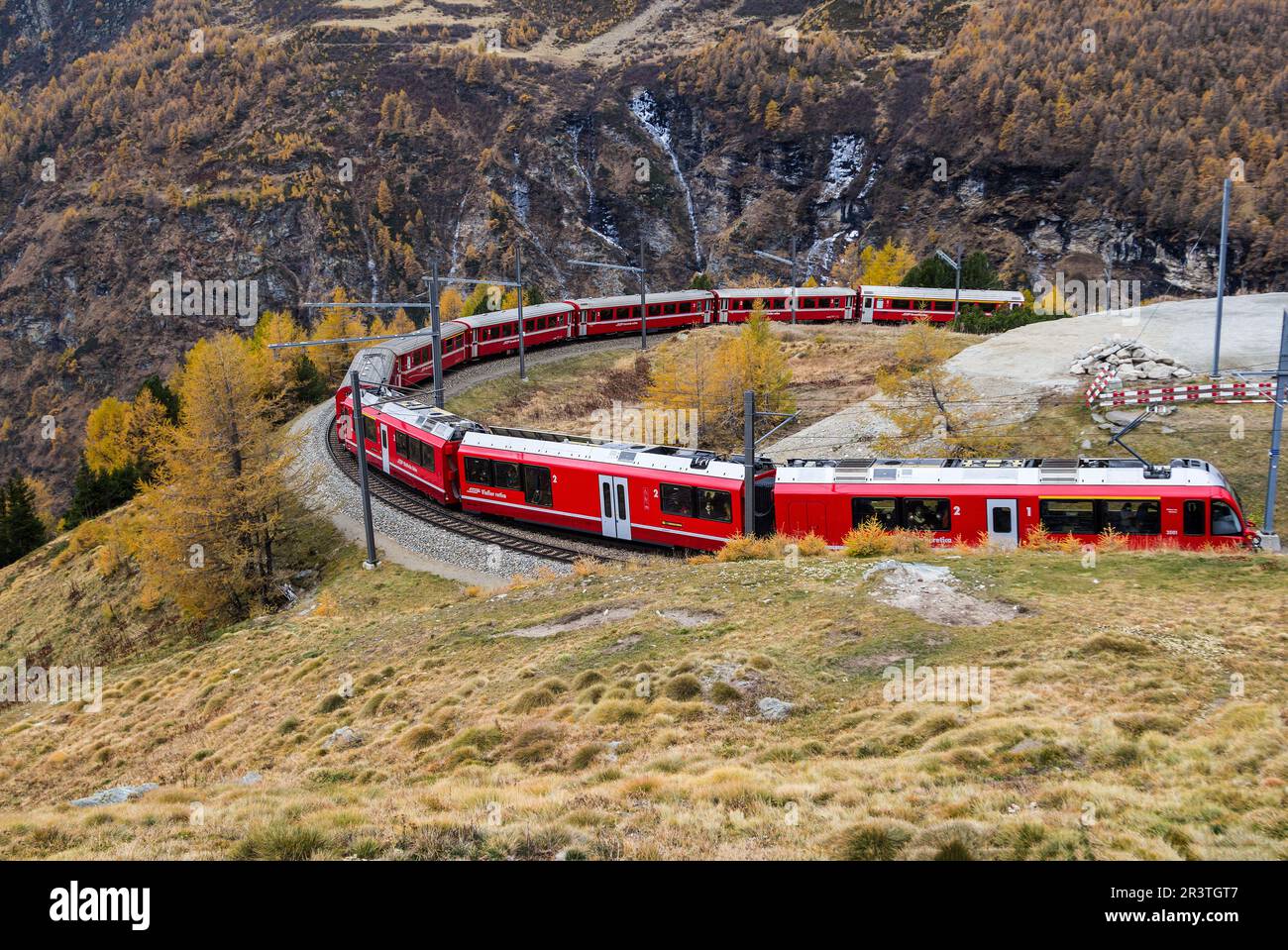 Alp Grum, Switzerland - October 30. 2021 : Red train from Rhaetian ...