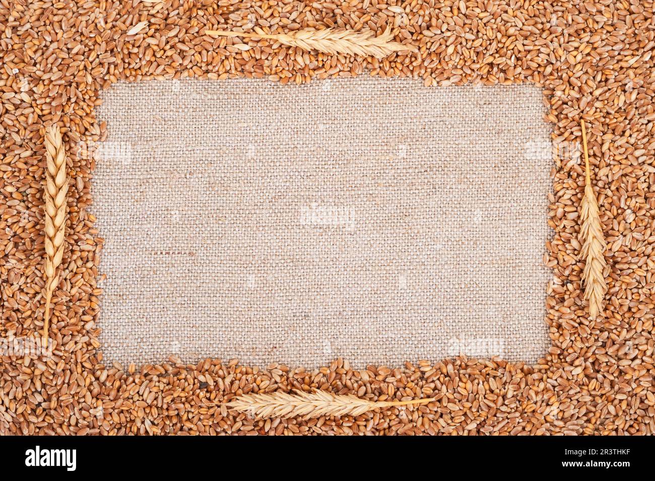 Frame of wheat on sacking Stock Photo - Alamy