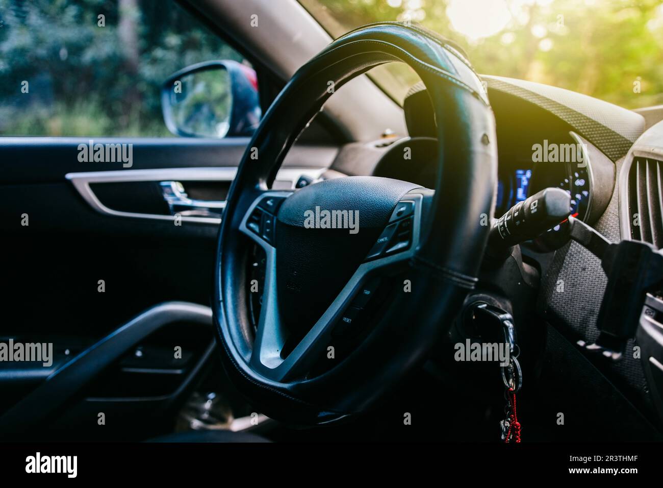 Close-up of the steering wheel of a modern car. View of the steering ...