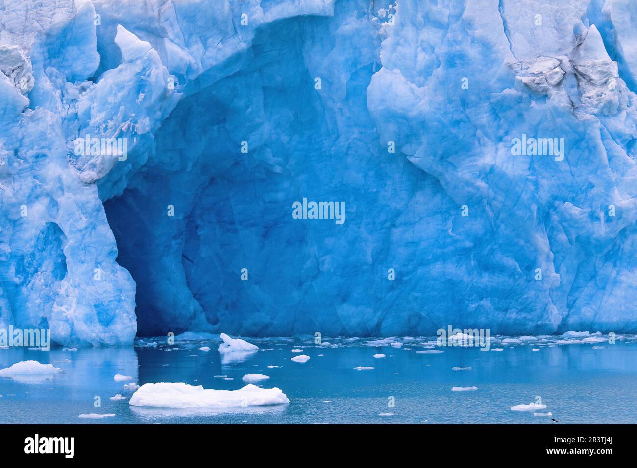 Glacier by the sea with a ice cave in Arctic, Svalbard, Spitsbergen ...