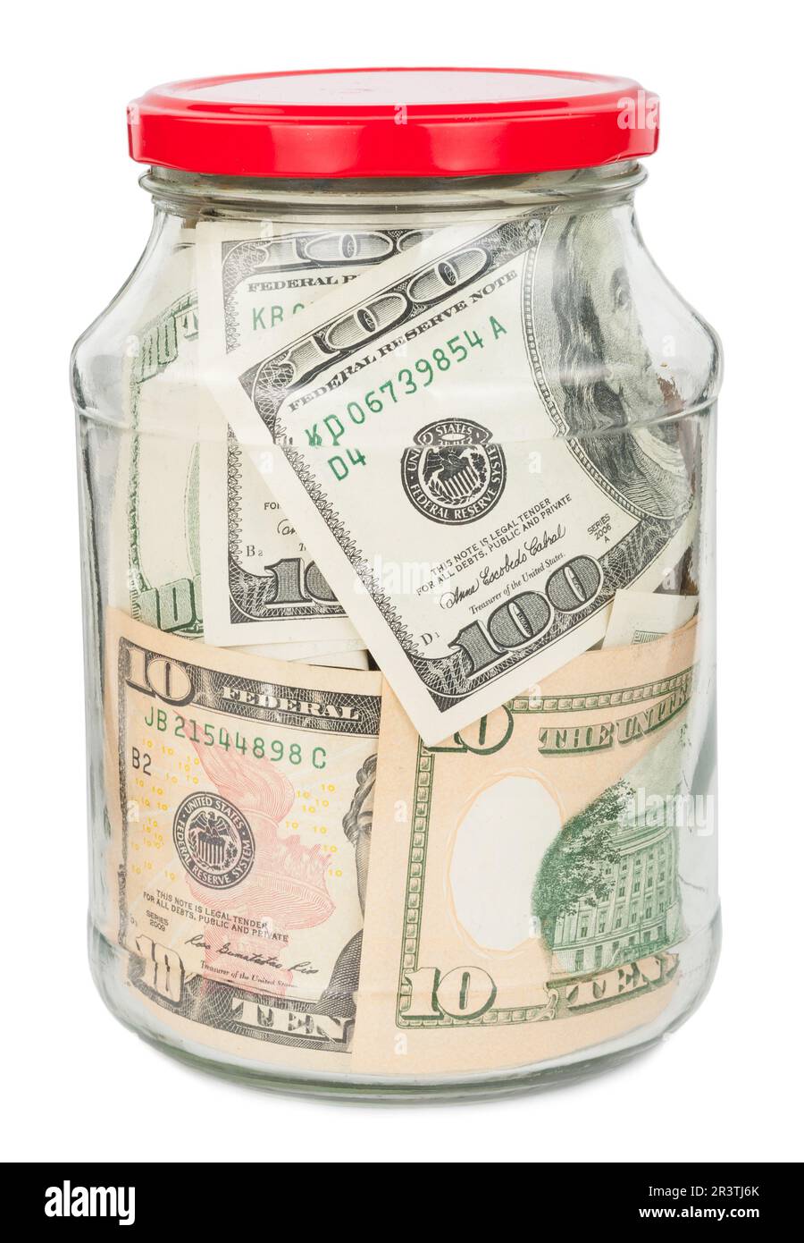 Many dollars in a glass jar Stock Photo - Alamy