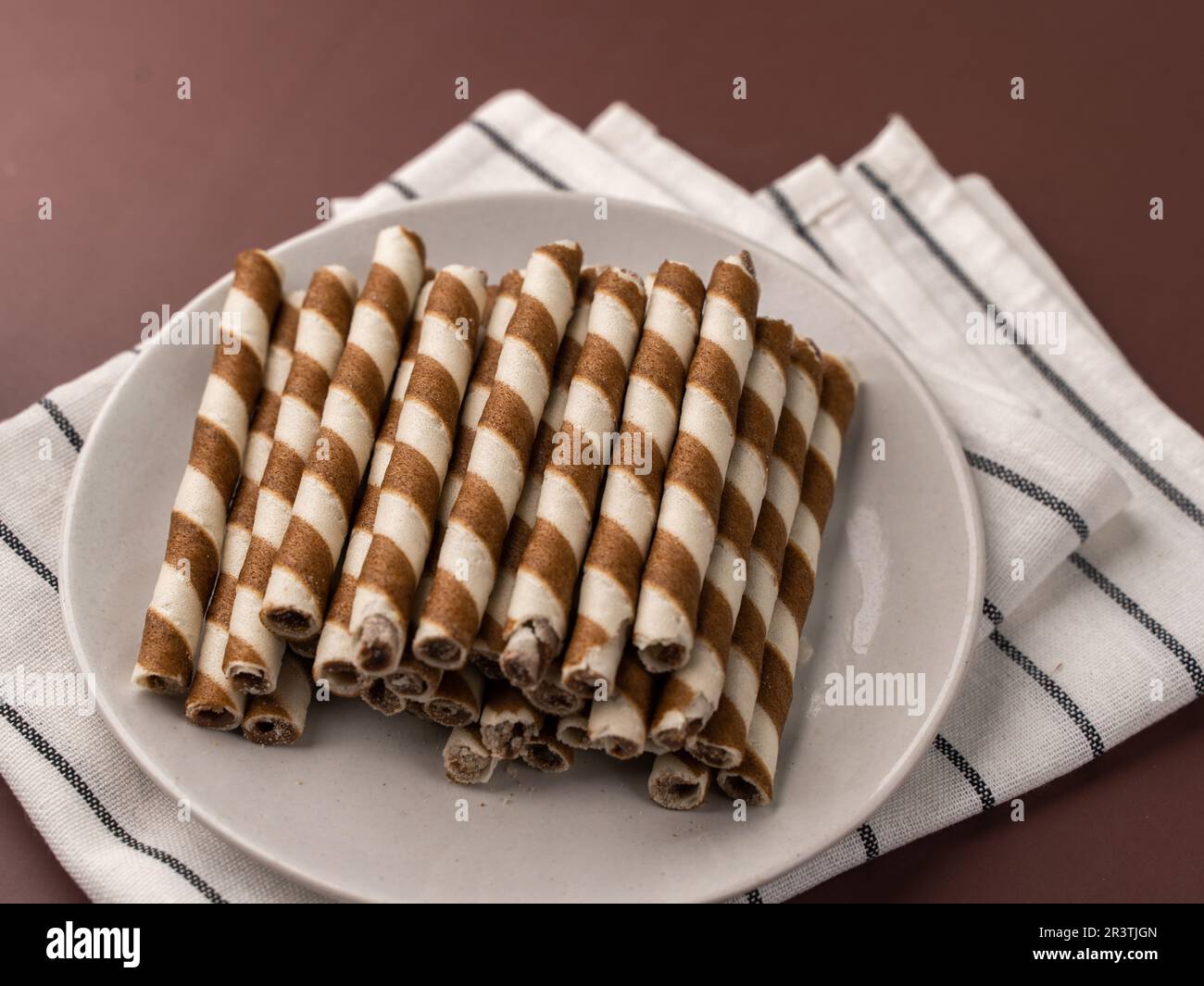 Wafer rolls with chocolate Lifestyle photography Stock Photo - Alamy