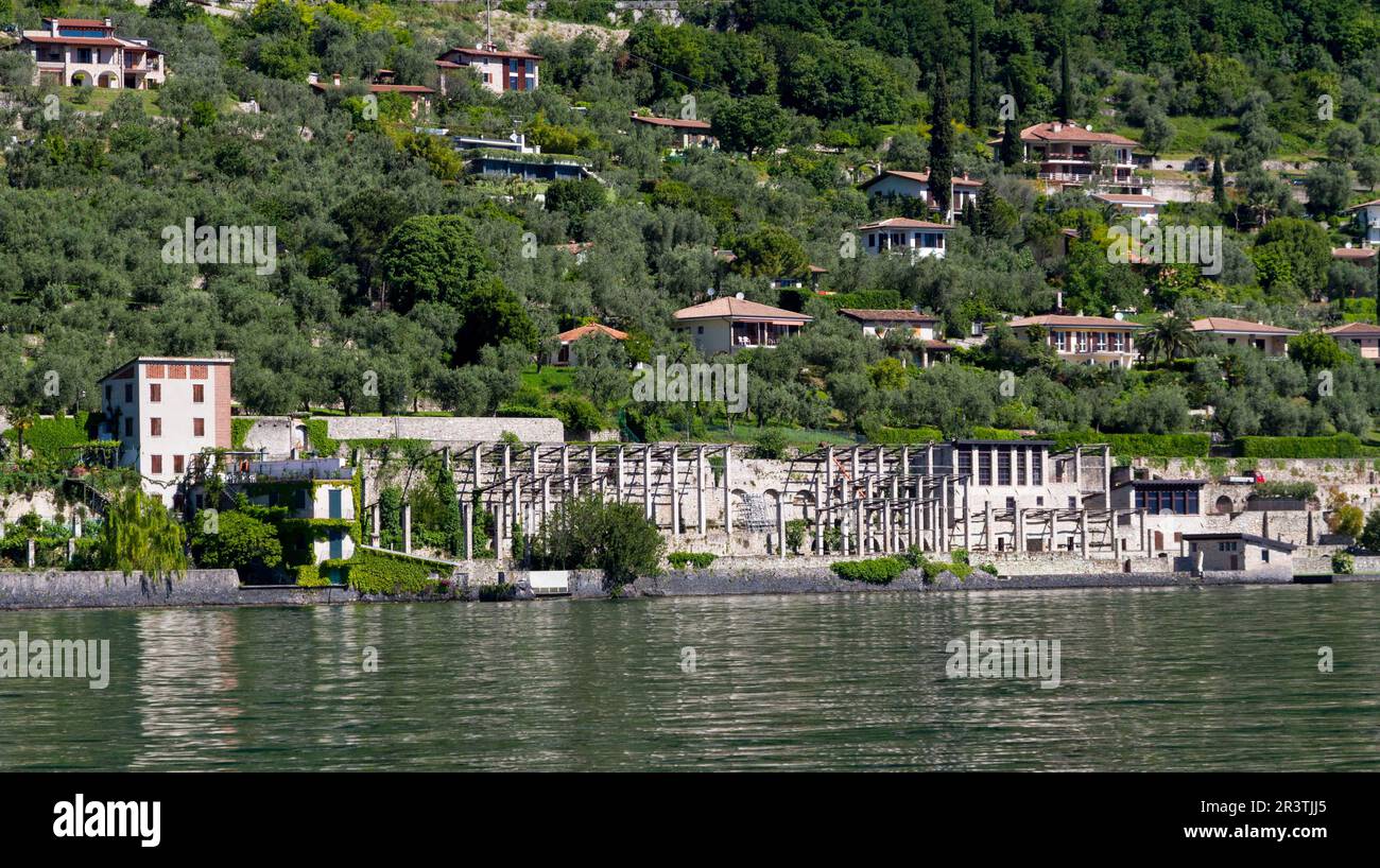 Traditional lemon greenhouse, also called limonaie on the shore of Lake ...