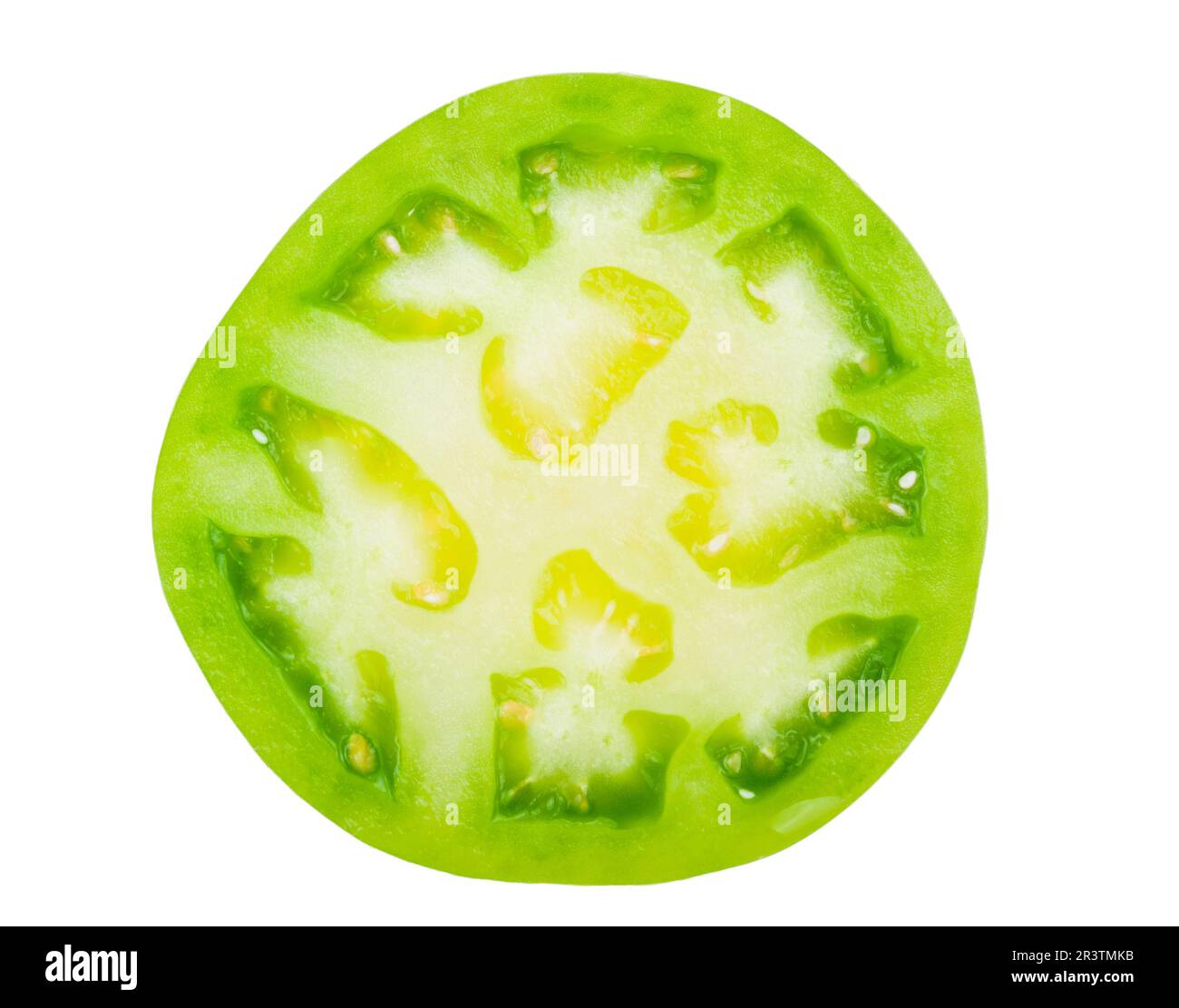 Slice of green tomatoes Stock Photo - Alamy
