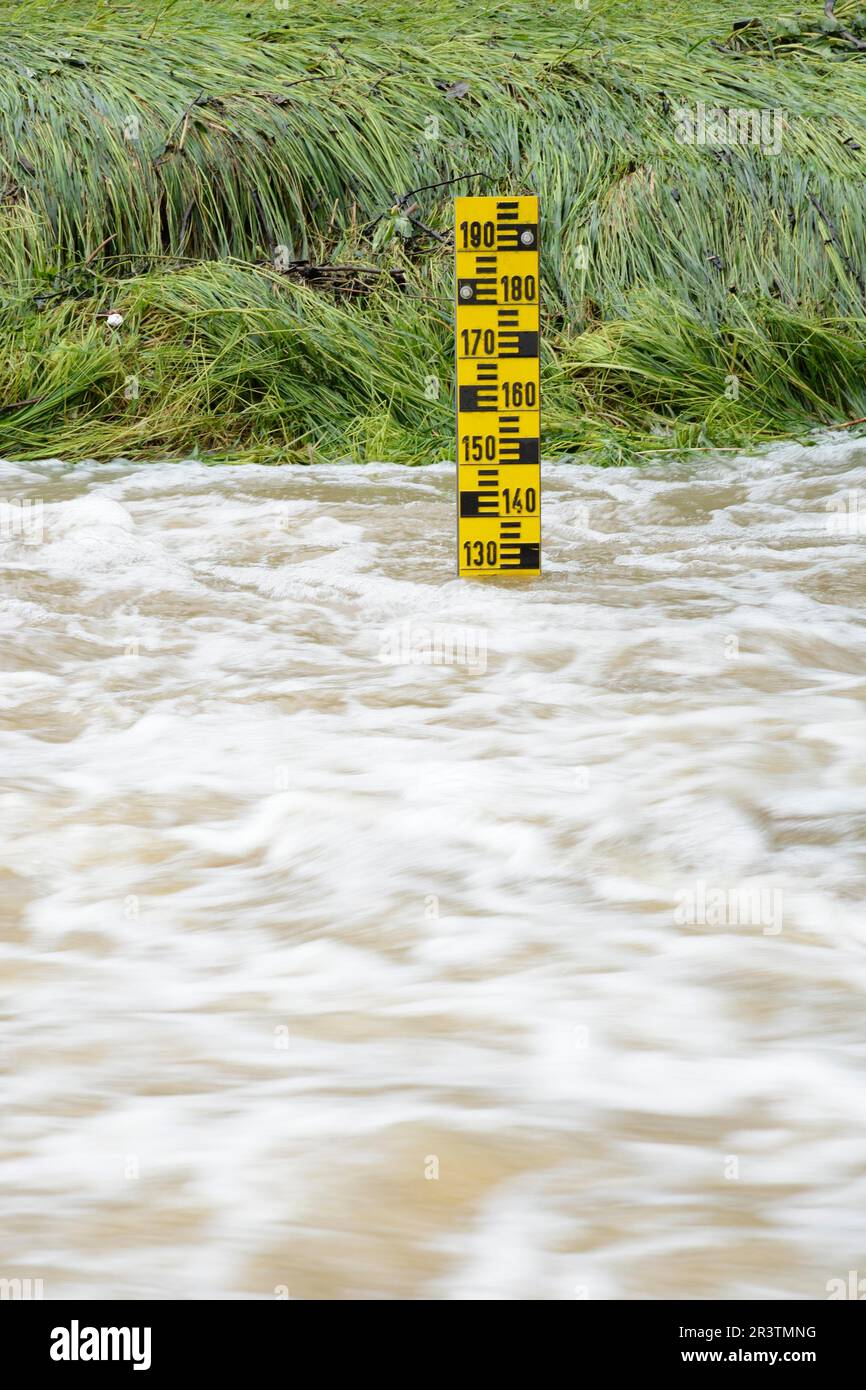Water level at an overflowing river Stock Photo - Alamy