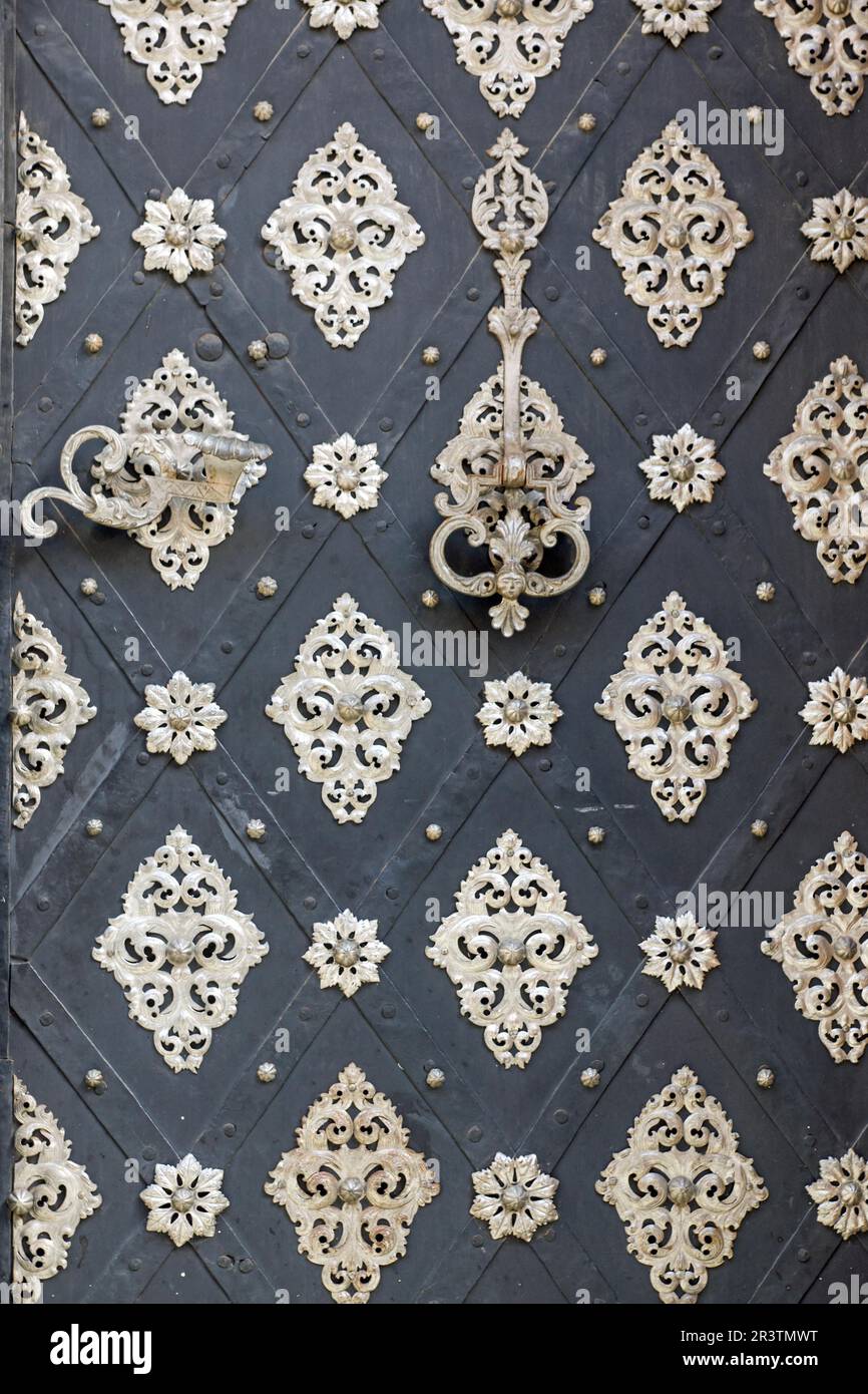 Detail of a door with silver decoration Stock Photo - Alamy