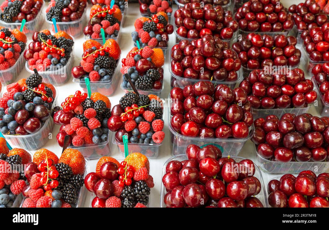Small fruit bowls with strawberries, cherries and other red fruits ...