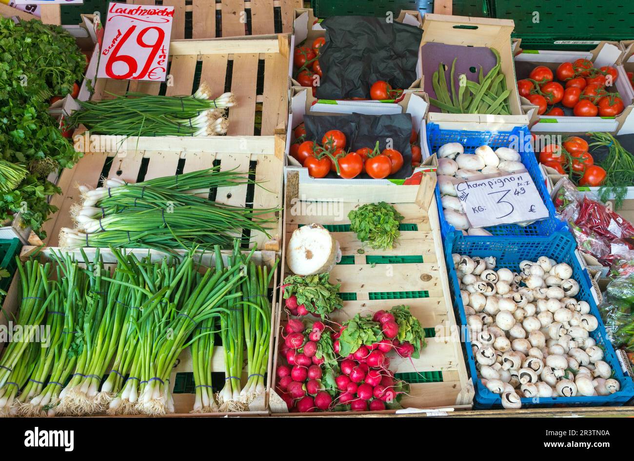 Spring onions and other vegetables for sale at the market Stock Photo ...