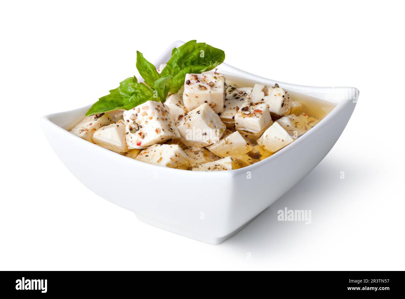 Cubed feta cheese on a white background Stock Photo - Alamy