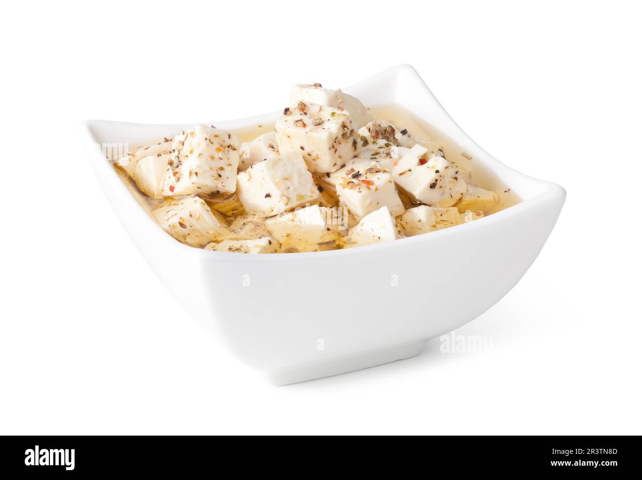 Cubed feta cheese on a white background Stock Photo - Alamy