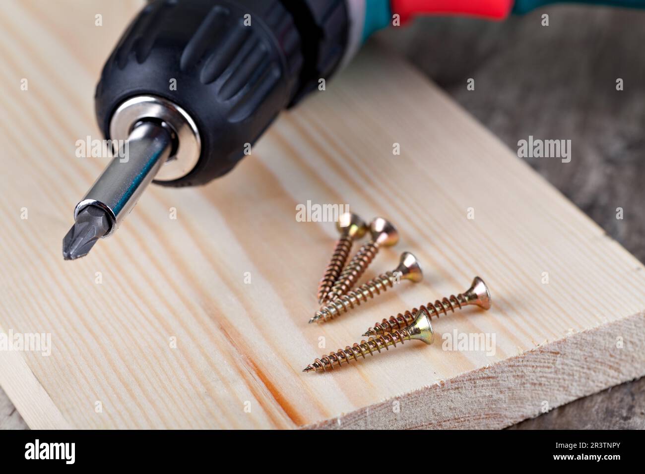 Battery screwdriver and screw Stock Photo - Alamy