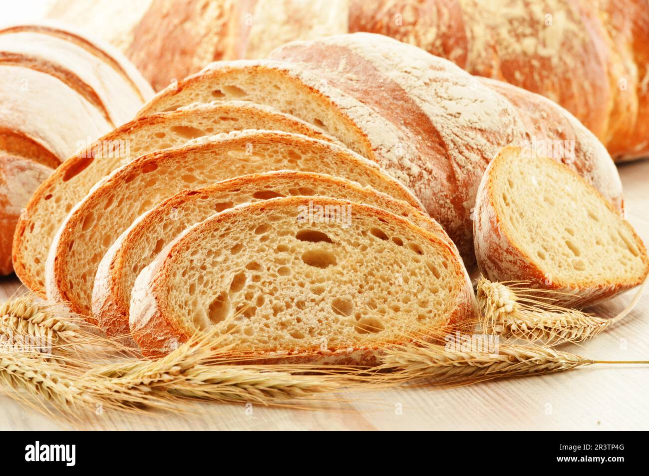 Composition with loafs of bread isolated on white background Stock ...