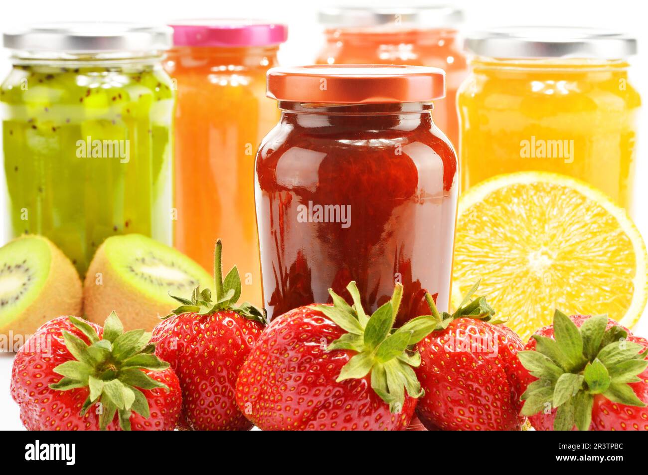 Composition with jars of fruity jams on white. Preserved fruits Stock ...