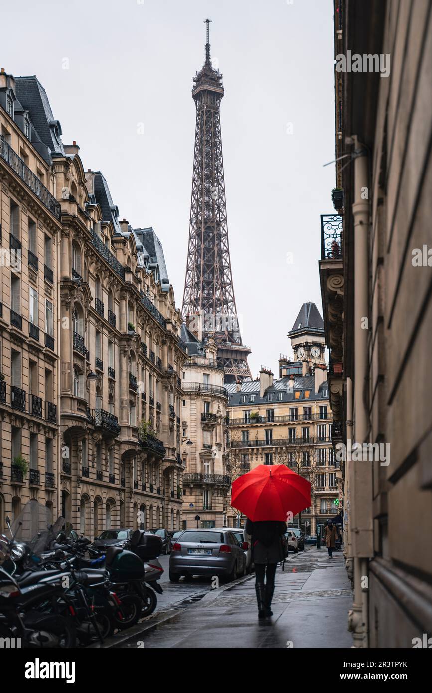 Women with red umbrella in front of the Eifel Tower, Rue Edmond ...