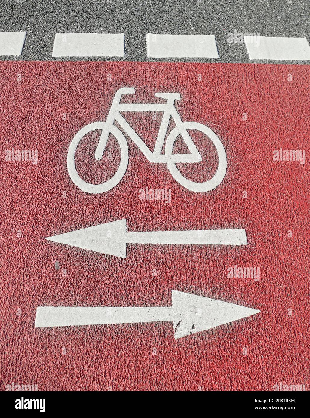Red cycle path with ground marking, Germany Stock Photo - Alamy