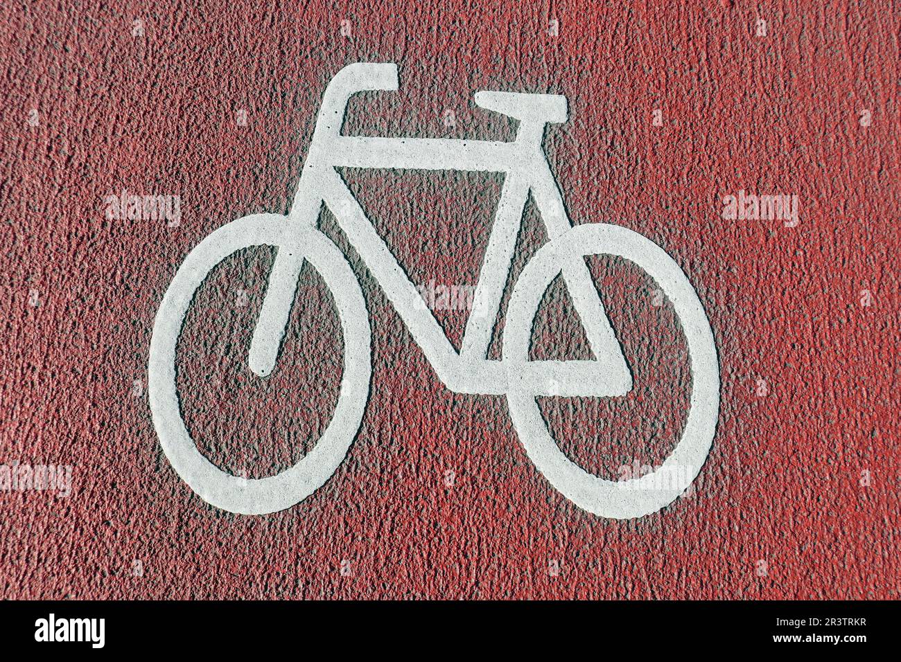 Red cycle path with ground marking, Germany Stock Photo - Alamy