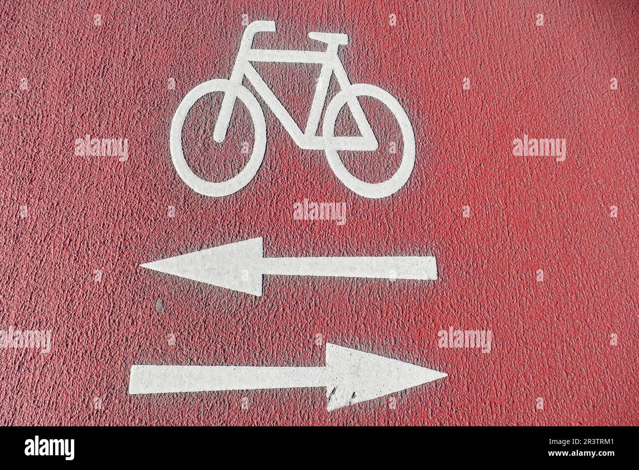 Red cycle path with ground marking, Germany Stock Photo - Alamy