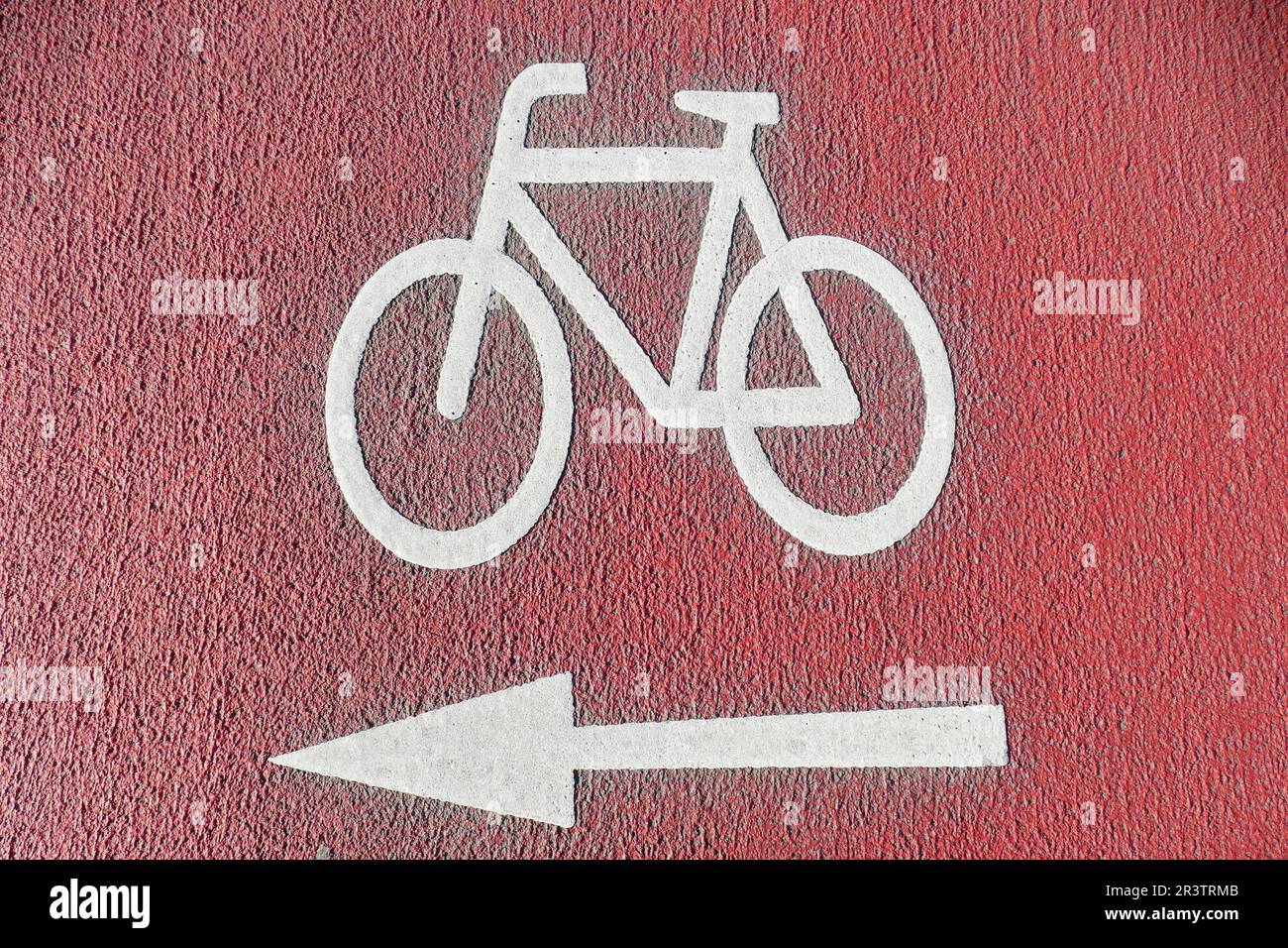 Red cycle path with ground marking, Germany Stock Photo - Alamy