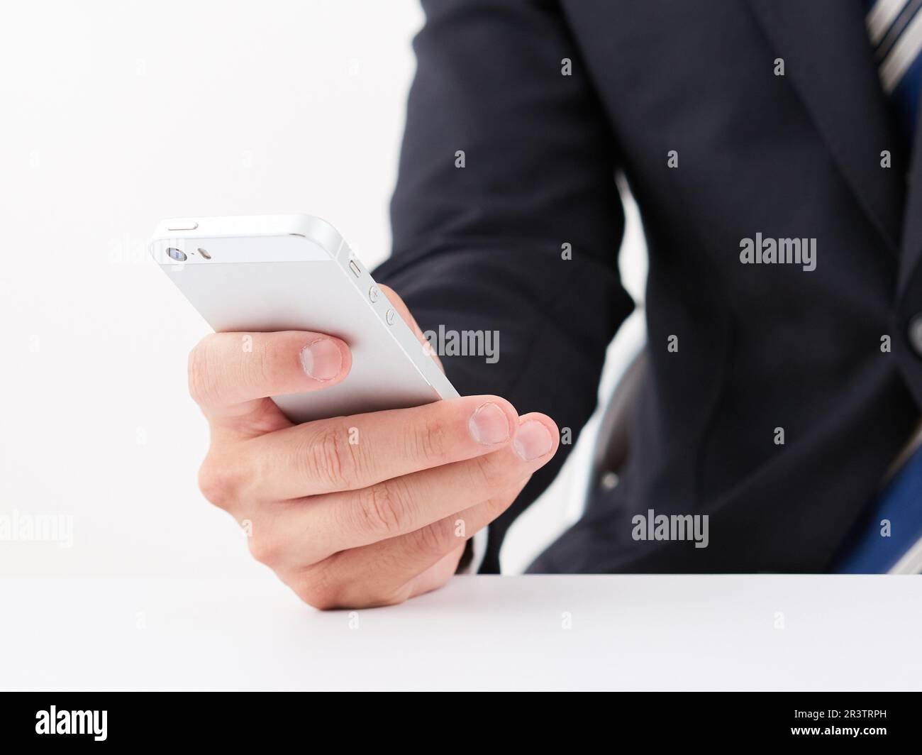 Japanese male businessman operating a smartphone Stock Photo - Alamy