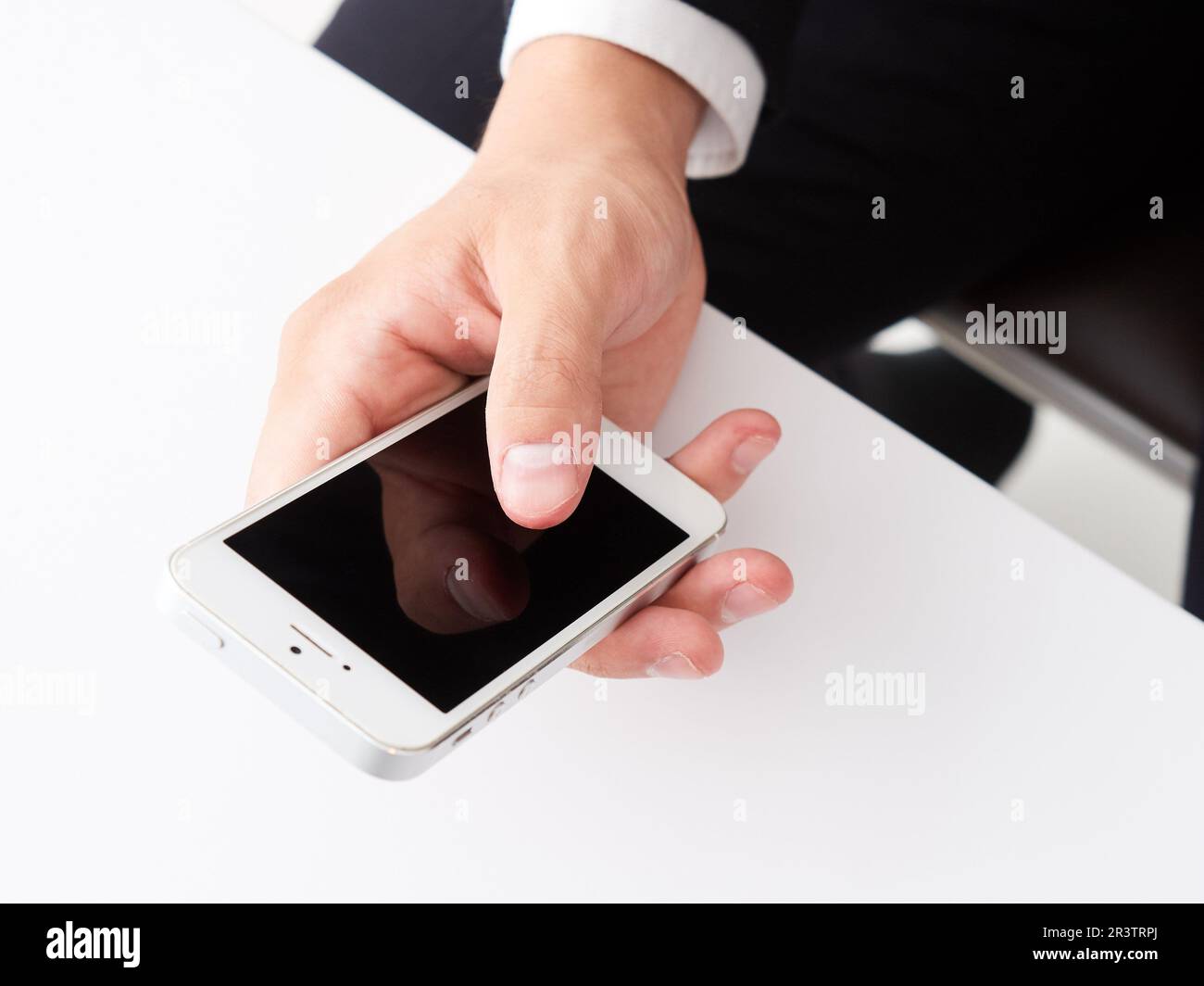 Japanese male businessman operating a smartphone Stock Photo - Alamy