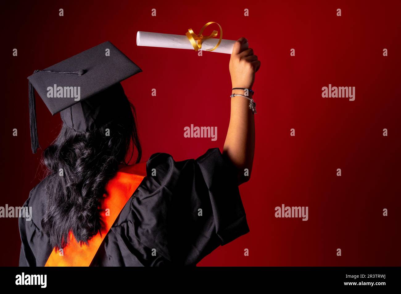 Female student in a graduation photo. End of education degree with ...