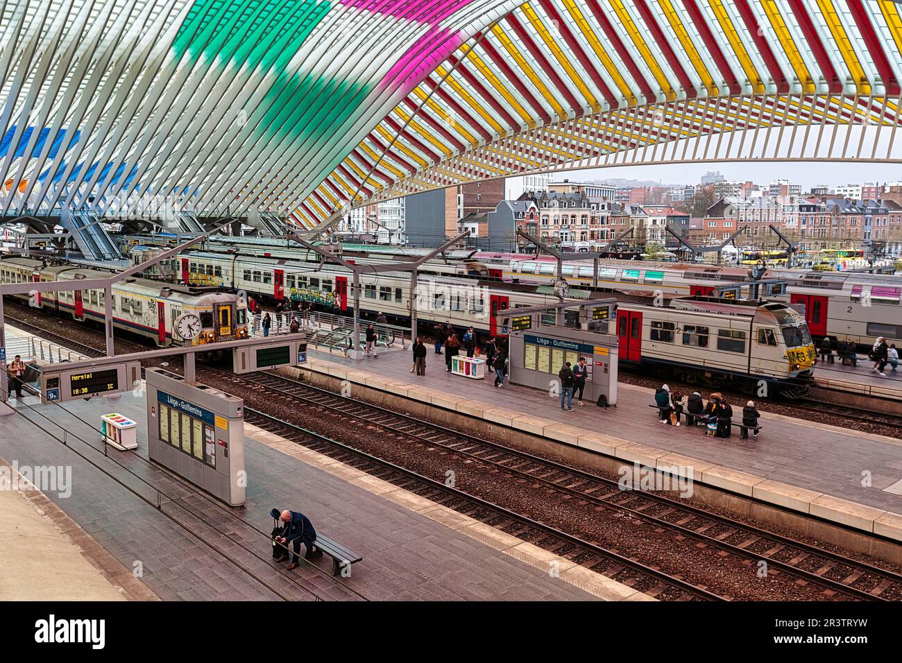 Station concourse, platform with skyline, colourful roof, artist Daniel ...