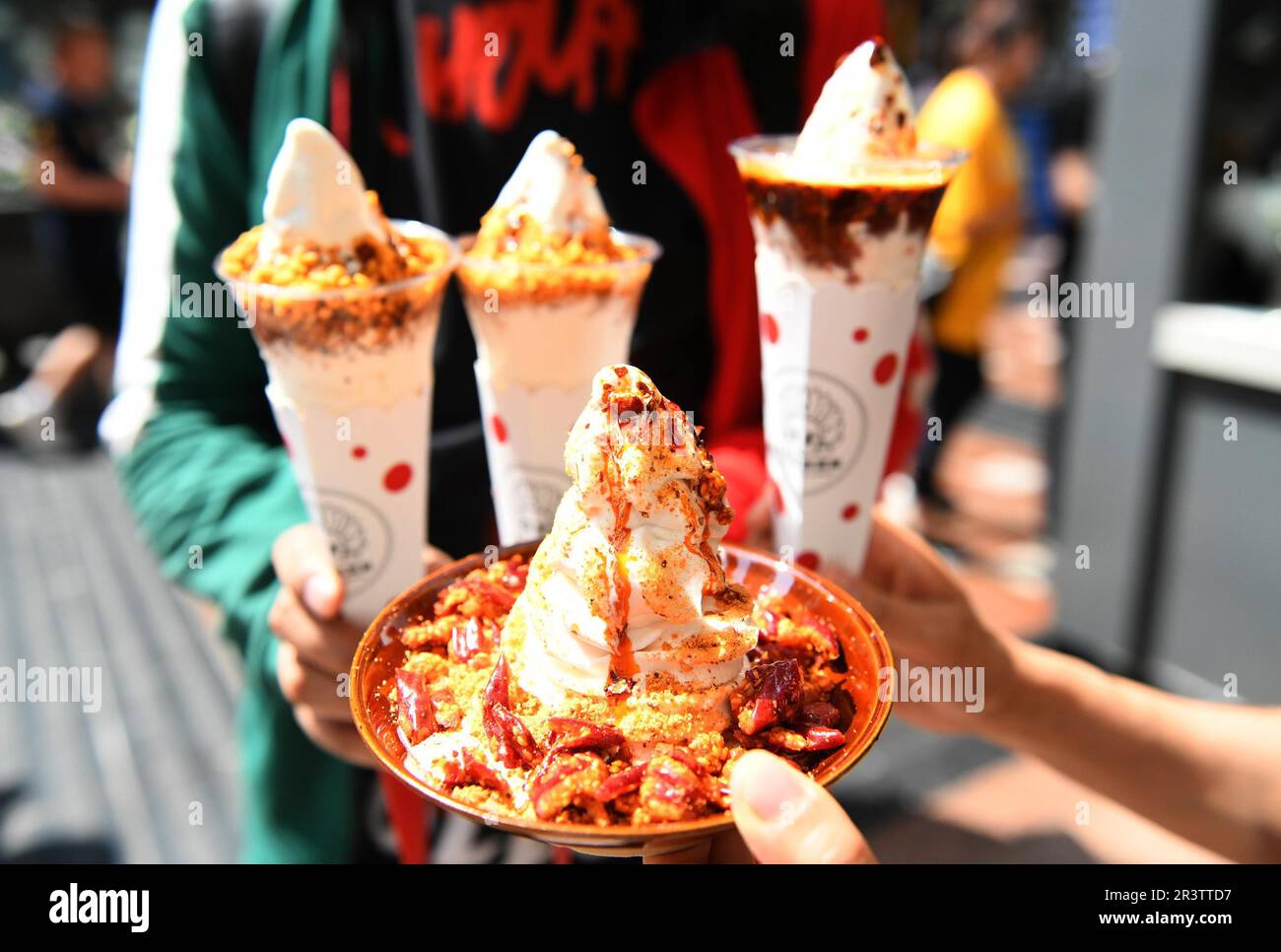 **CHINESE MAINLAND, HONG KONG, MACAU AND TAIWAN OUT** Customers display ...