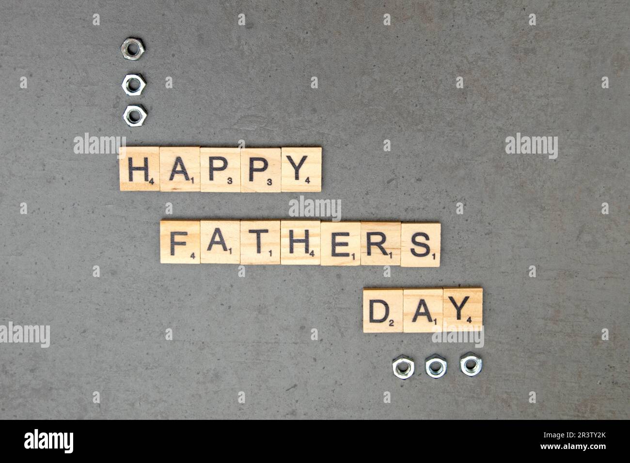 Scrabble letters happy father's day textured background. Copy space ...