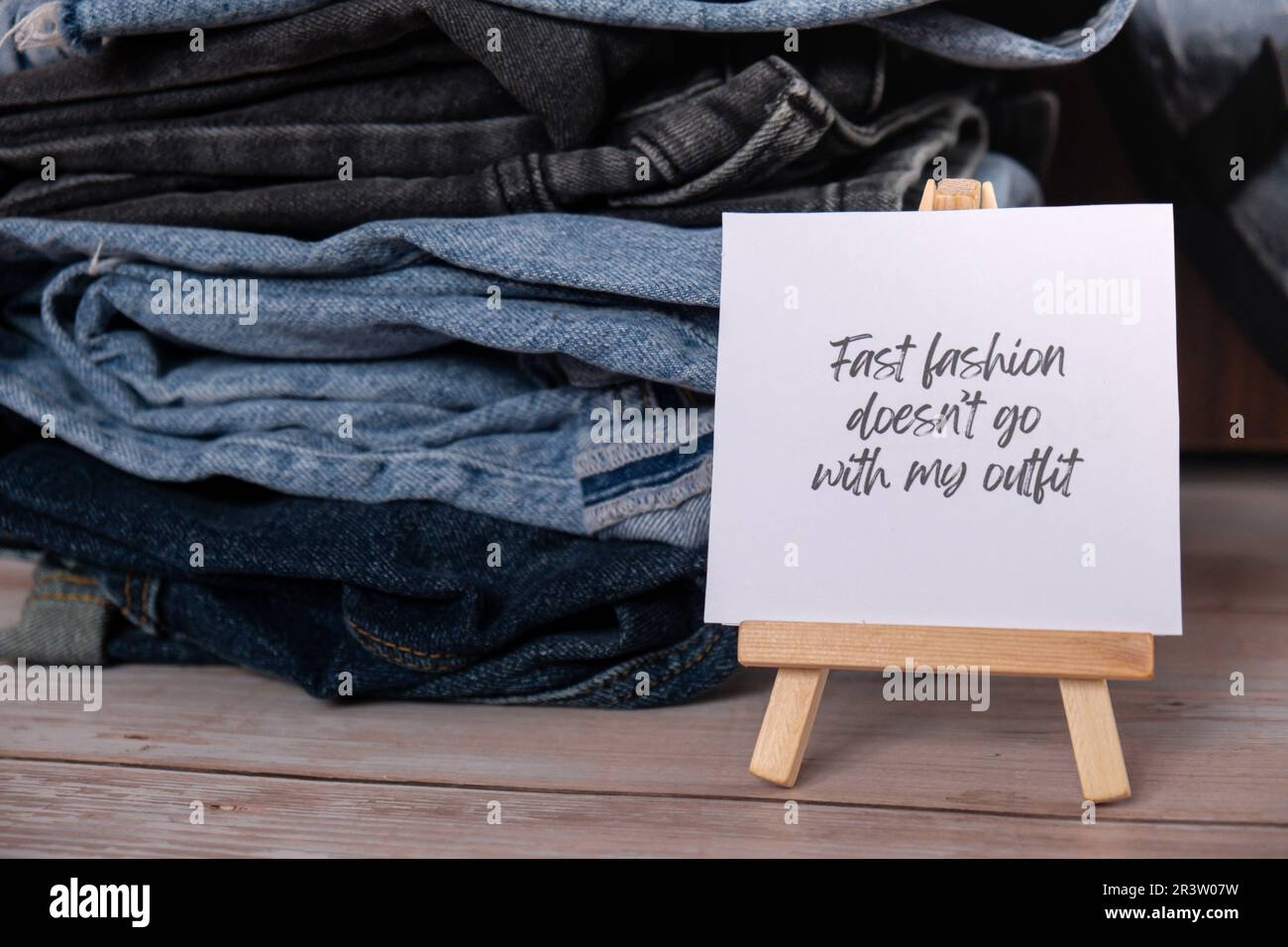 FAST FASHION DOESNT GO WITH MY OUTFIT text on paper note on Jeans ...