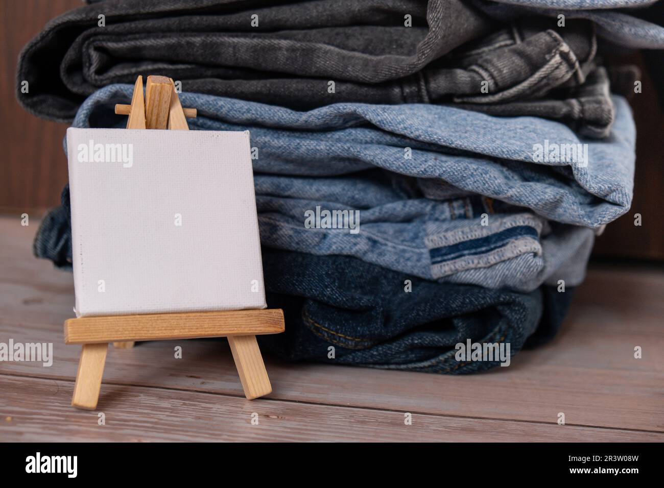 Empty board with copy space for your text. Abstract Stack of jeans ...
