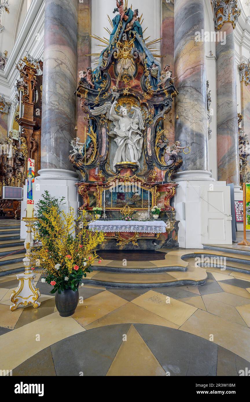 Side altar with floral decoration and annual candle, Ottobeuren ...