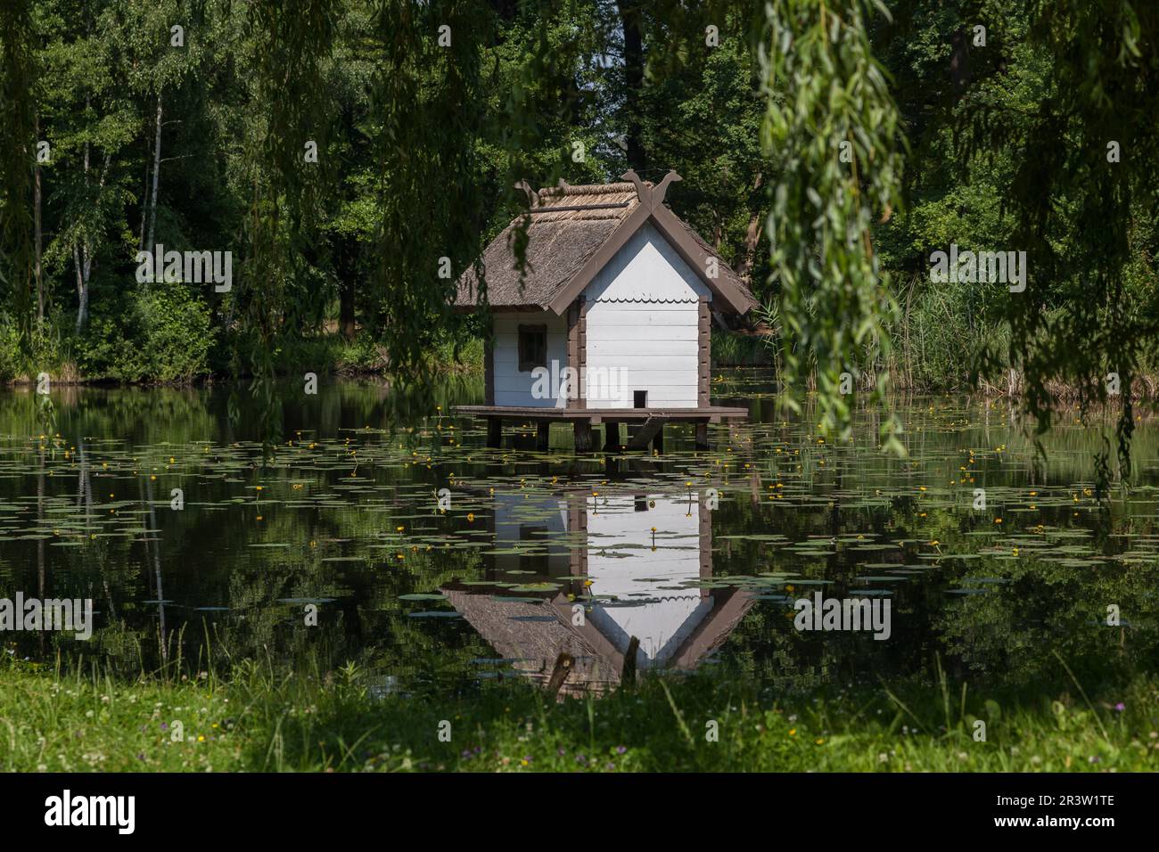 Luebbenau Castle Park with lake and duck house Stock Photo - Alamy
