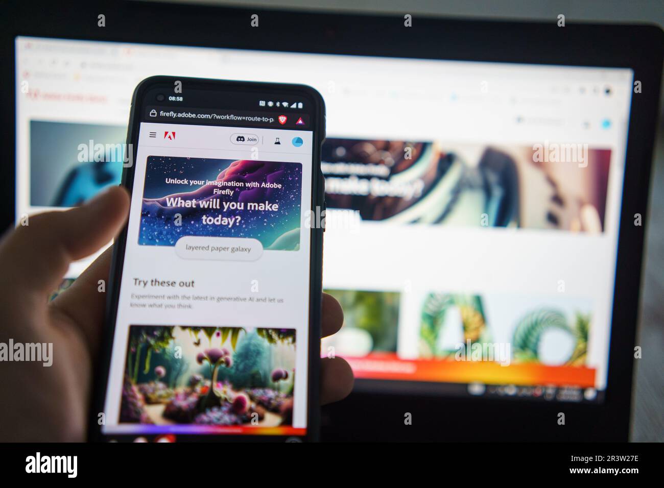 Adobe Firefly on PC and Smartphone screen Stock Photo - Alamy