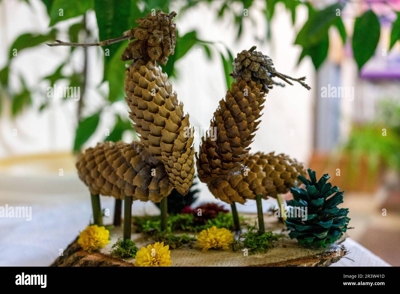 Two deer are made of cones. Children's creativity Stock Photo - Alamy