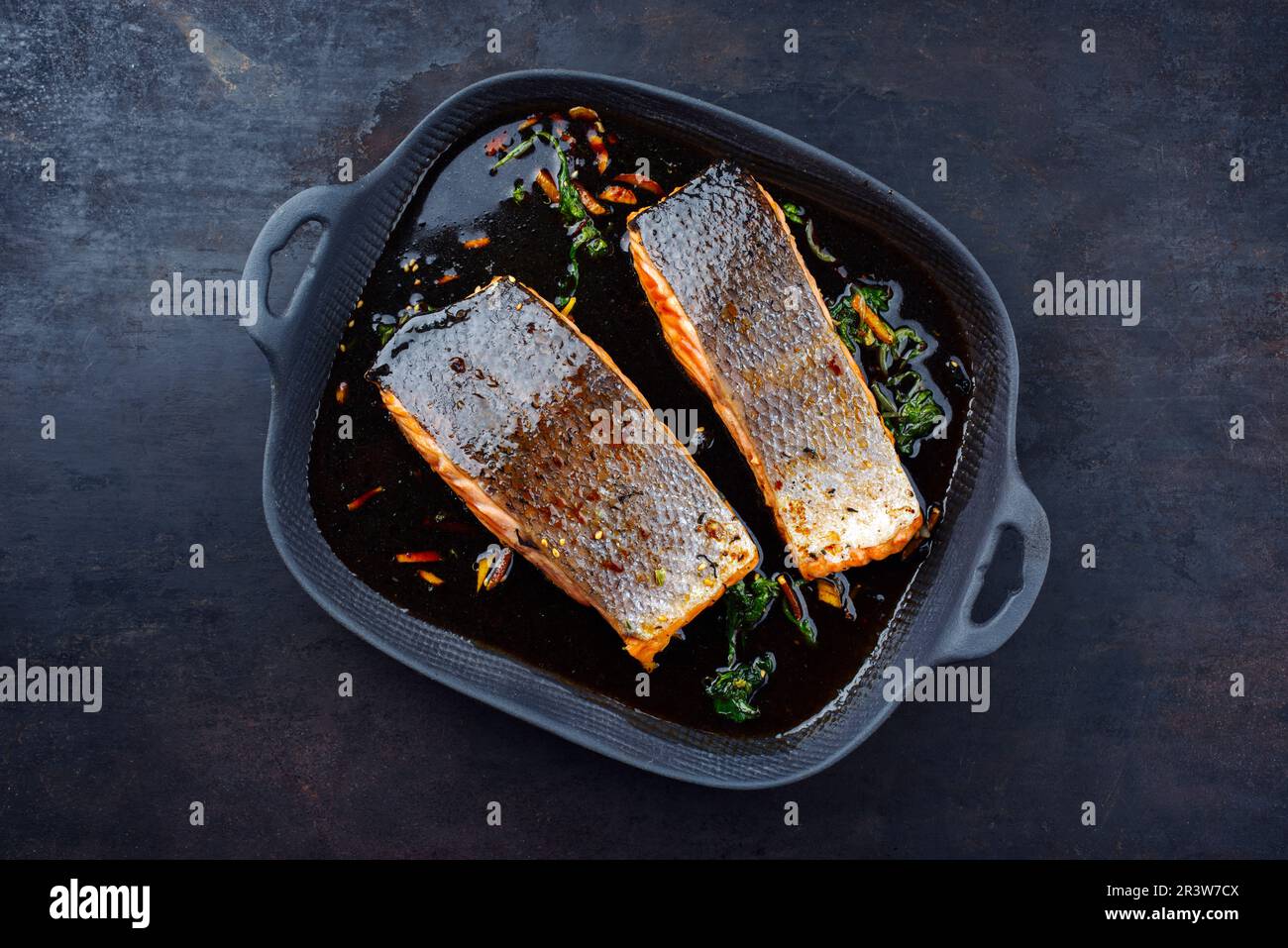 Traditional Japanese salmon fish teriyaki filet with soy souce and ...