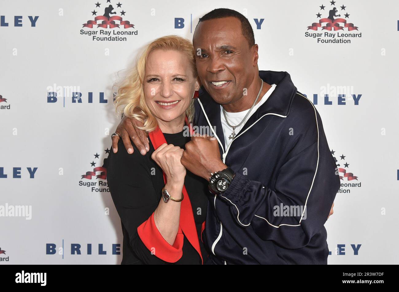 Daisy Lang, left, and Sugar Ray Leonard arrive at the 12th annual Sugar ...