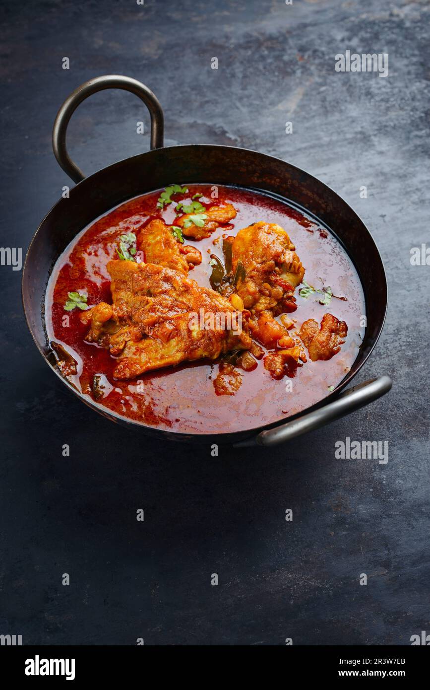 Traditional spicy Indian chicken Madras curry Rogan Josh with ...