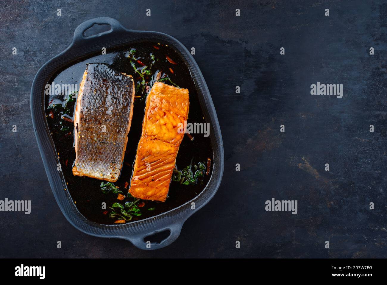 Traditional Japanese salmon fish teriyaki filet with soy souce and ...