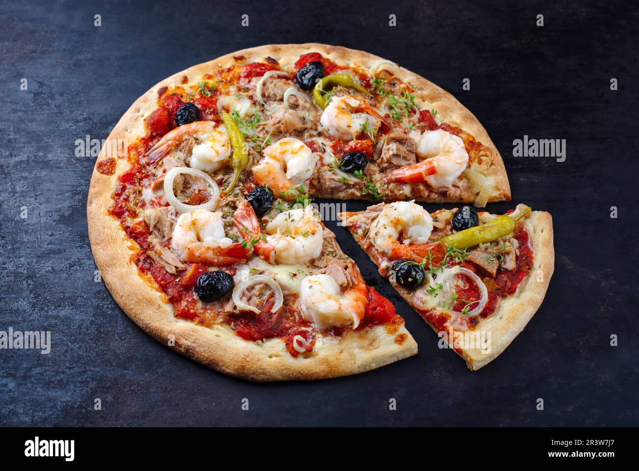 Traditional Italian pizza frutti di mare with king prawns Stock Photo ...