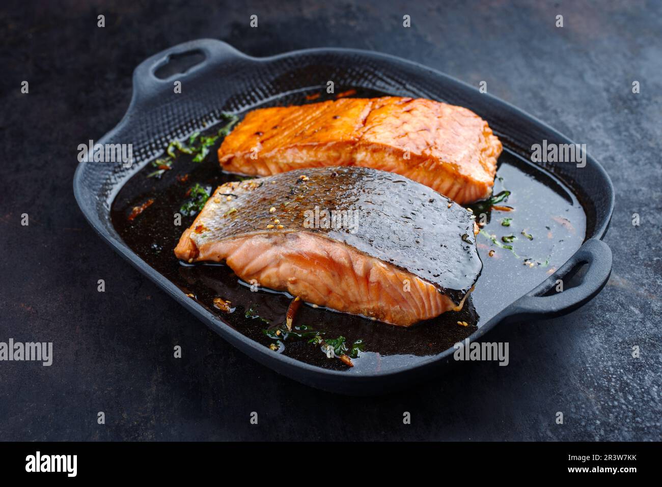 Traditional Japanese salmon fish teriyaki filet with soy souce and ...