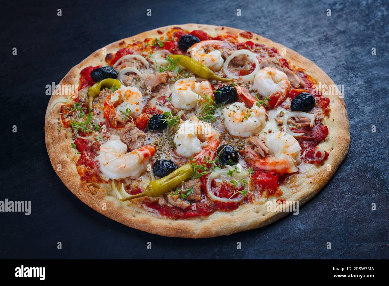 Traditional Italian pizza frutti di mare with king prawns Stock Photo ...