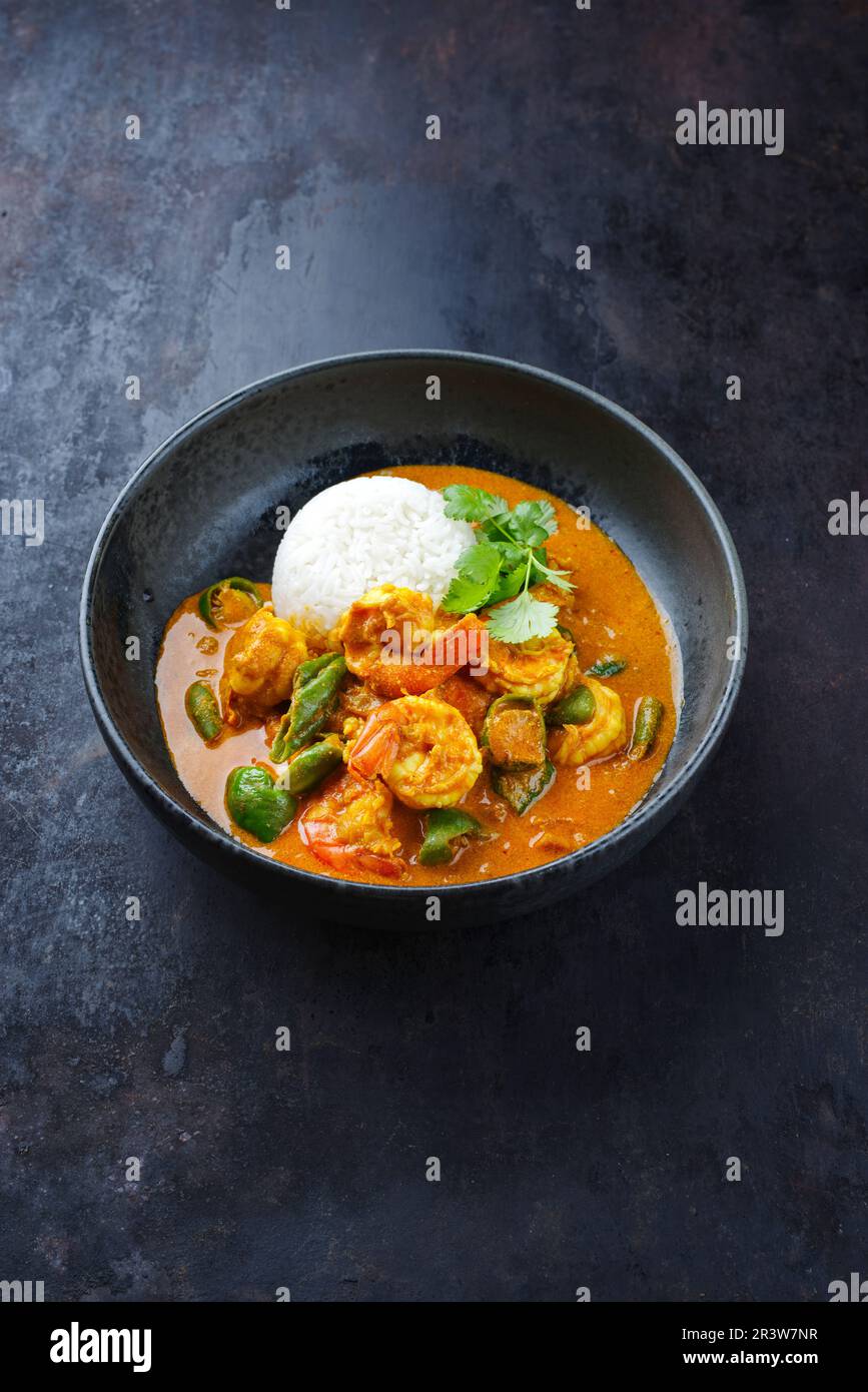Traditional Thai kaeng phet red curry with chili and basmati rice ...