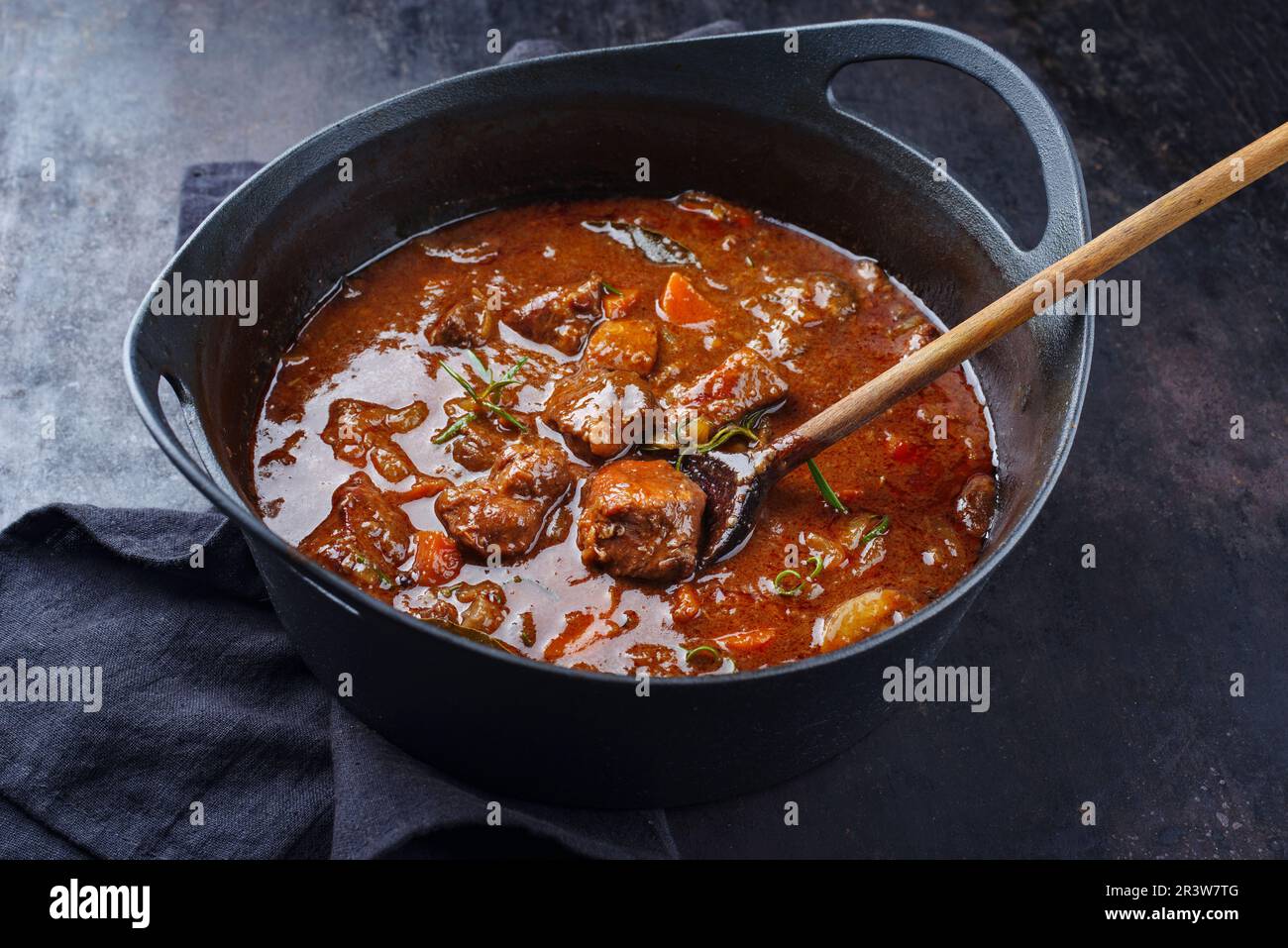 Traditional Hungarian braised venison goulash with vegetable and herbs ...