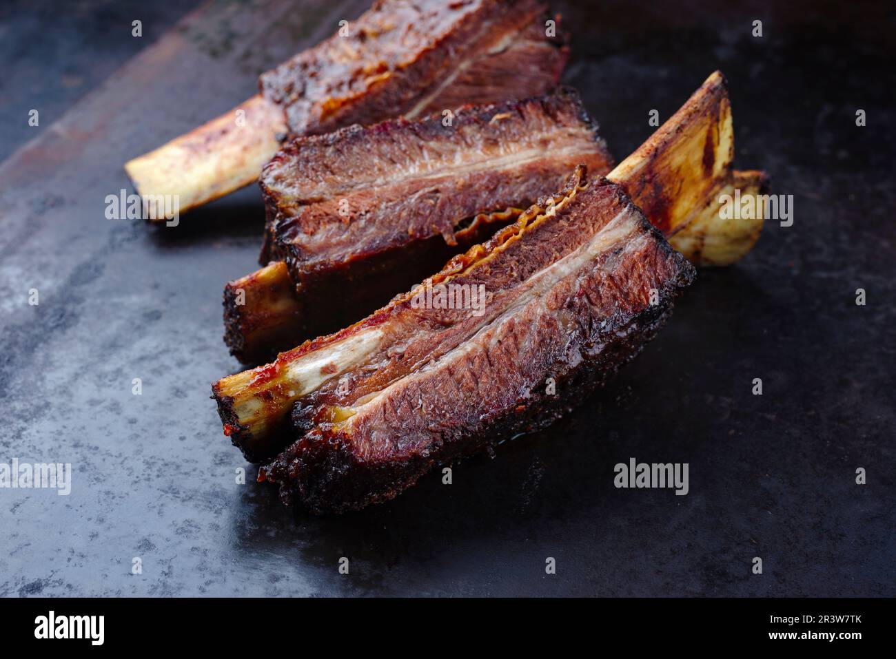 Traditional barbecue burnt chuck short beef ribs marinated with spicy ...