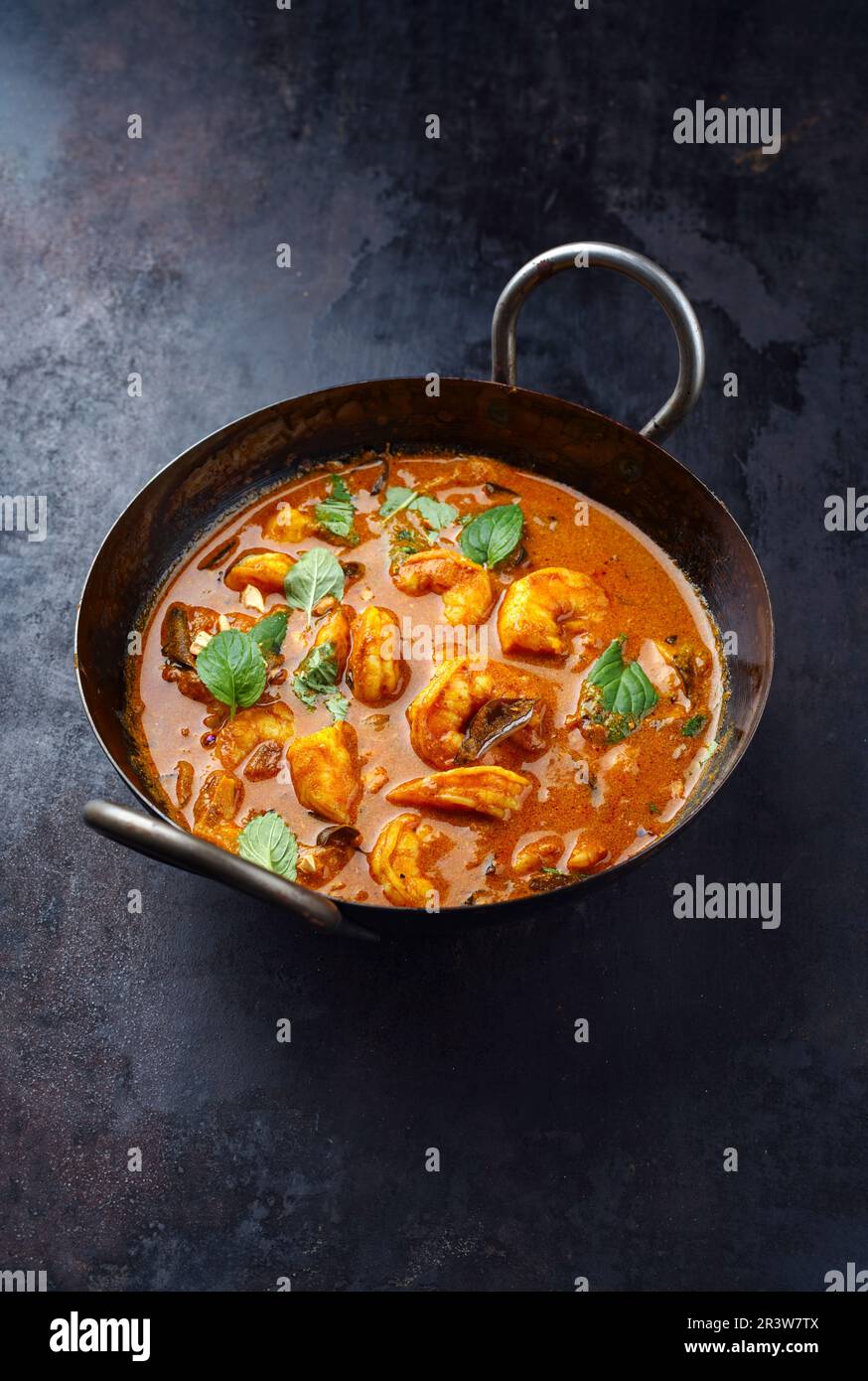 Traditional spicy Indian prawn Madras curry Rogan Josh with king prawns ...