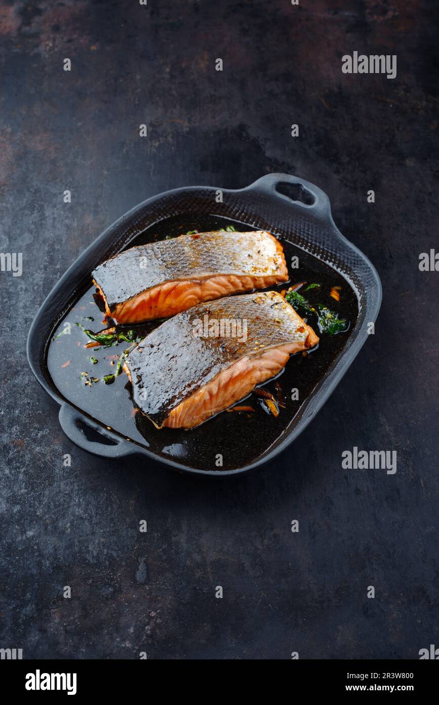 Traditional Japanese salmon fish teriyaki filet with soy souce and ...