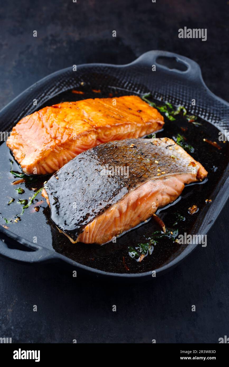 Traditional Japanese salmon fish teriyaki filet with soy souce and ...