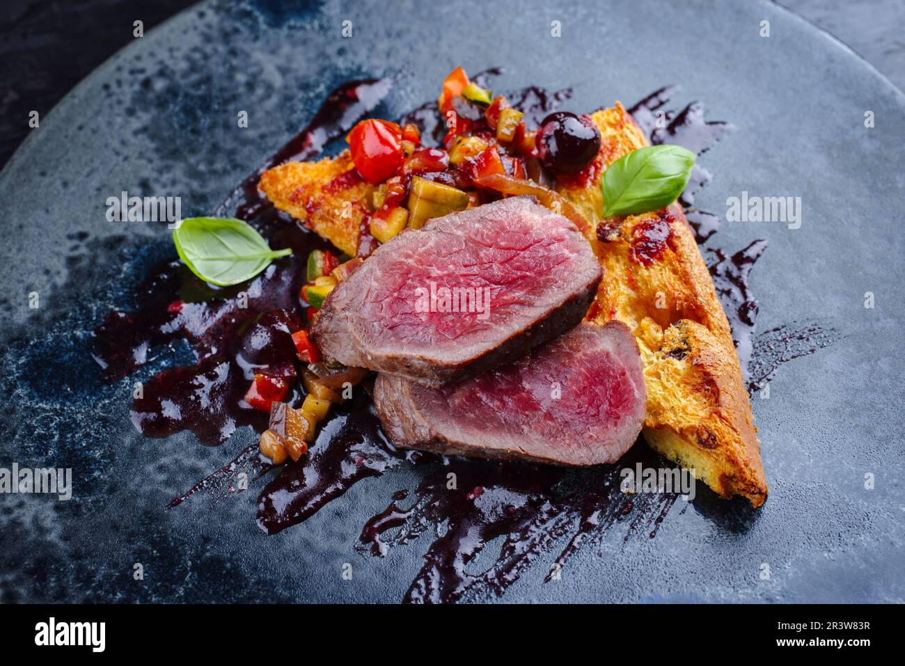 Traditional roasted Italian panettone tagliata di manzo with sliced ...